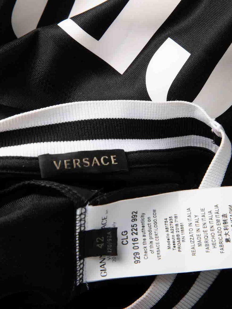 Versace Women's Black 1978 Motif Bat Wing Top For Sale at 1stDibs