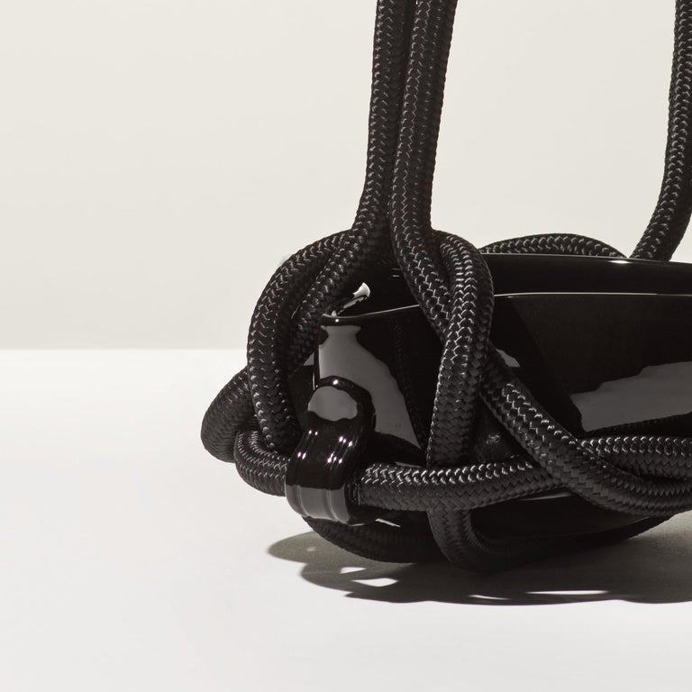 Wheeled spout with loops, black glaze, black nylon rope, Gatti 1928 ...