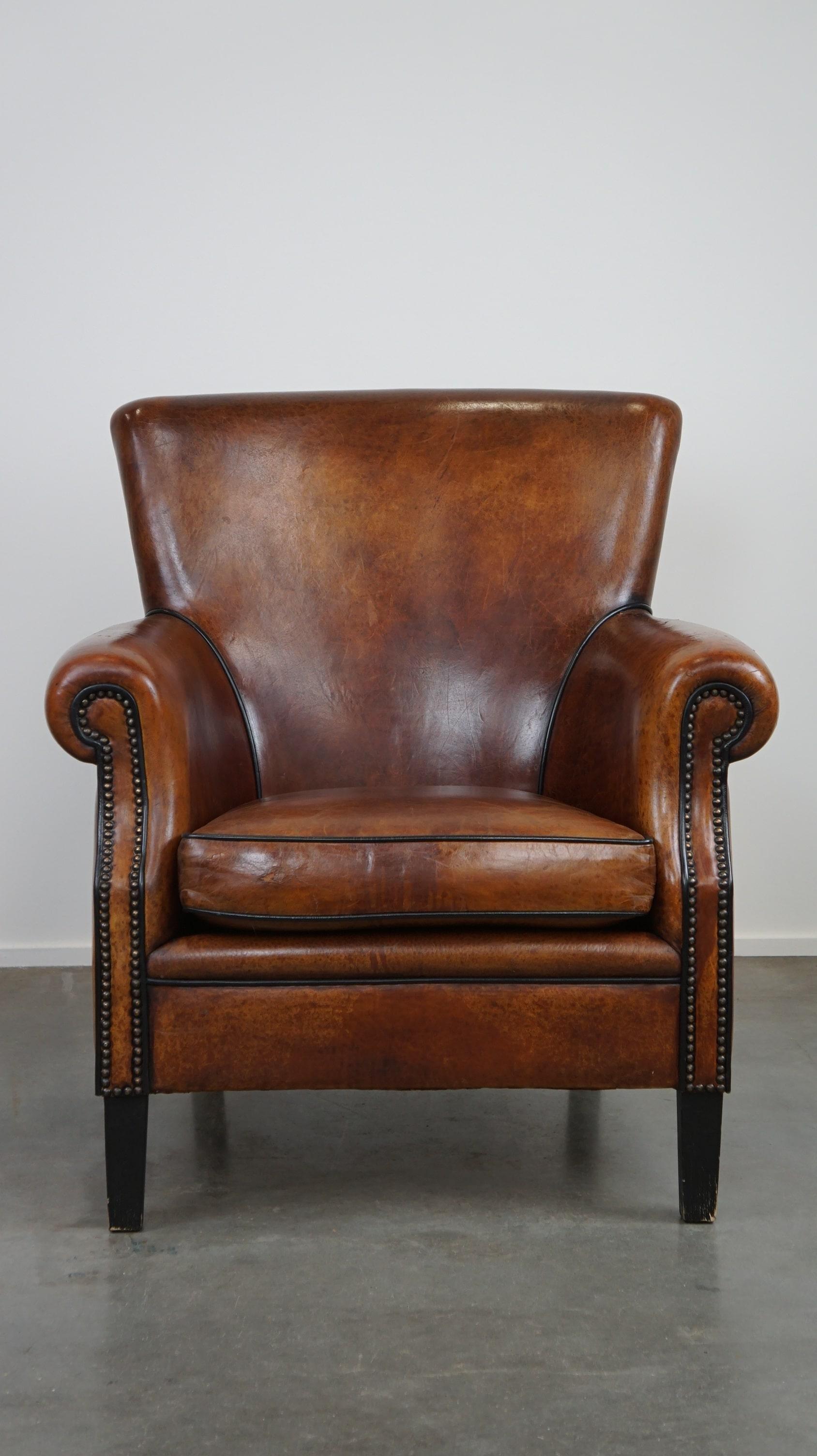 Very comfortable classic sheepskin leather armchair with beautiful warm ...