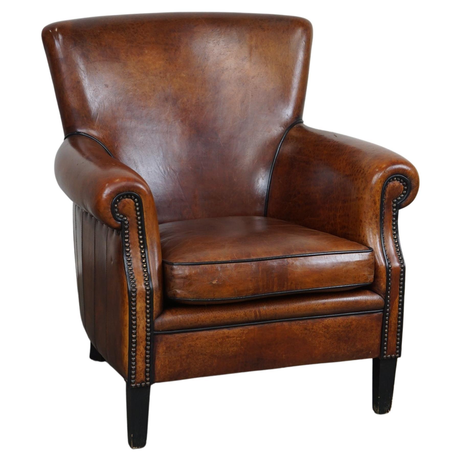 Very comfortable classic sheepskin leather armchair with beautiful warm ...
