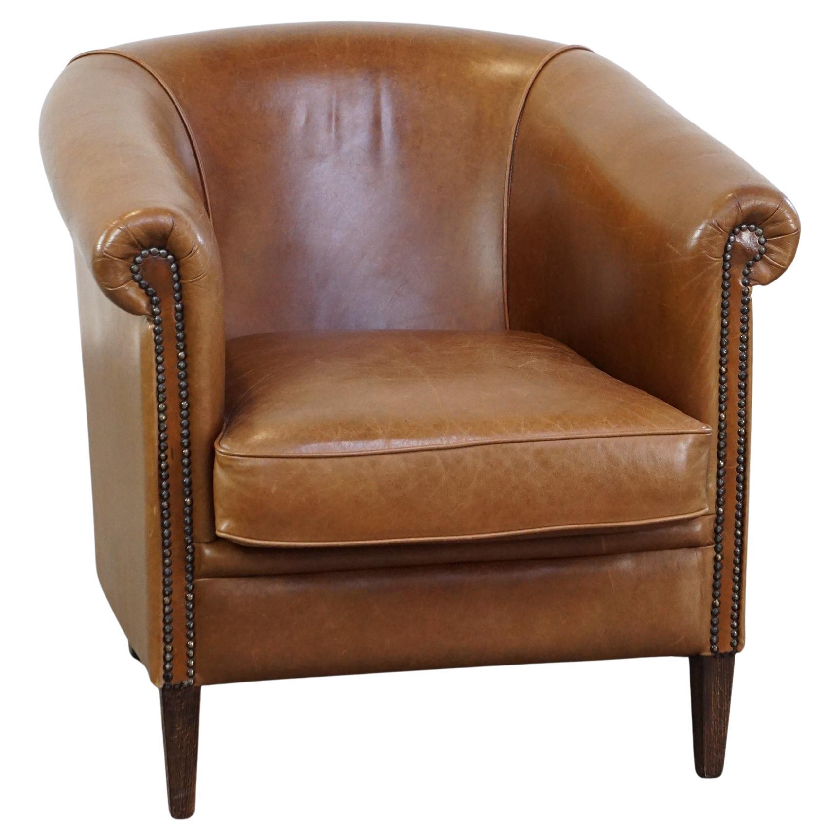 Very comfortable cowhide leather club armchair with a beautiful proper finish