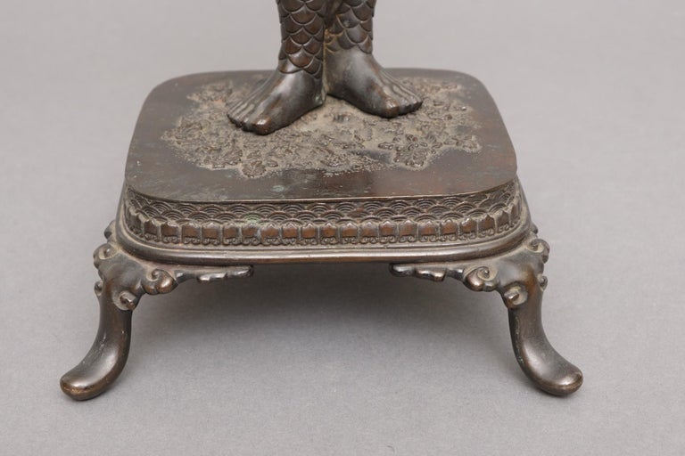 Japanese Bronze Okimono of a 'Karasu Tengu' 鴉天狗 Holding Up a Flower ...