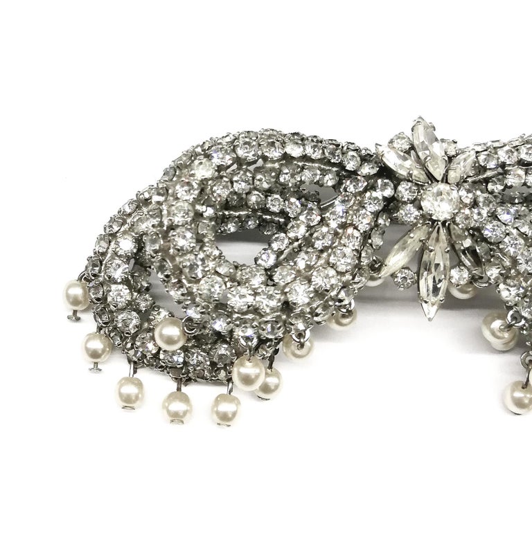 Very large clear paste and pearl 'bow' brooch, Roger Jean-Pierre ...