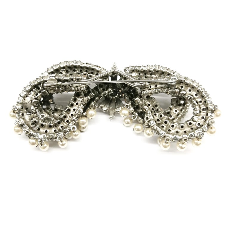Very large clear paste and pearl 'bow' brooch, Roger Jean-Pierre ...