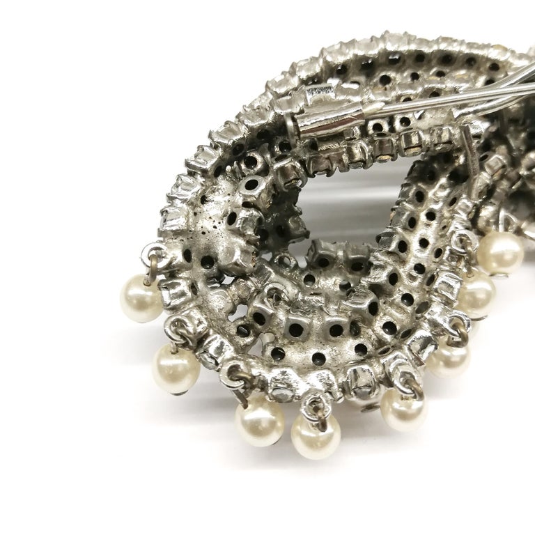 Very large clear paste and pearl 'bow' brooch, Roger Jean-Pierre ...