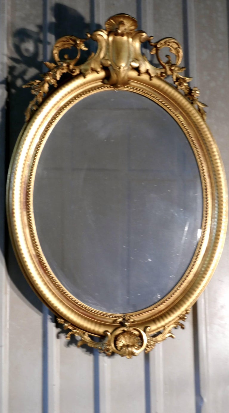 Very Large French Rococo Oval Gilt Wall Mirror For Sale at 1stDibs