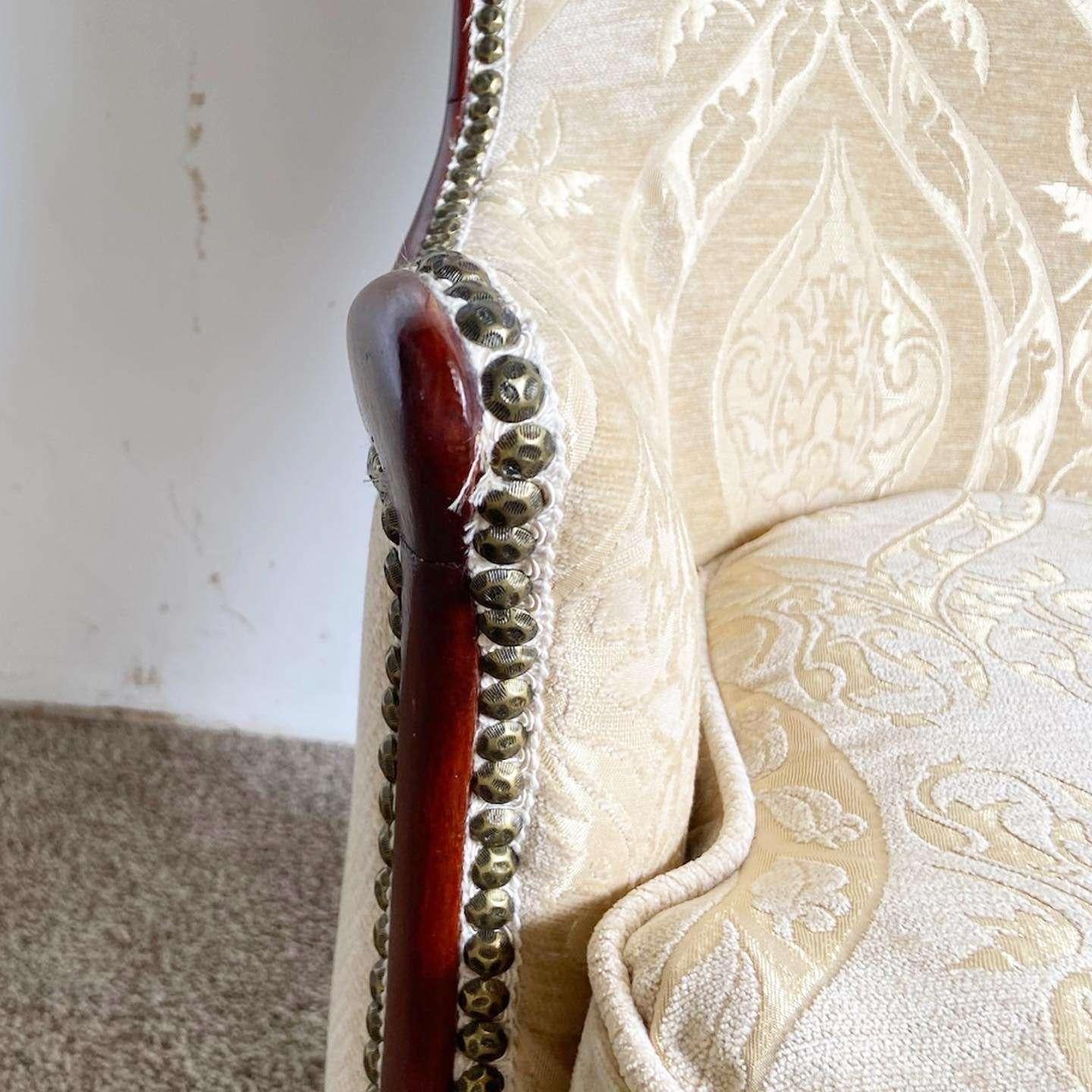 Victorian Style Carved Wingback Chair With Ottoman For Sale at 1stDibs