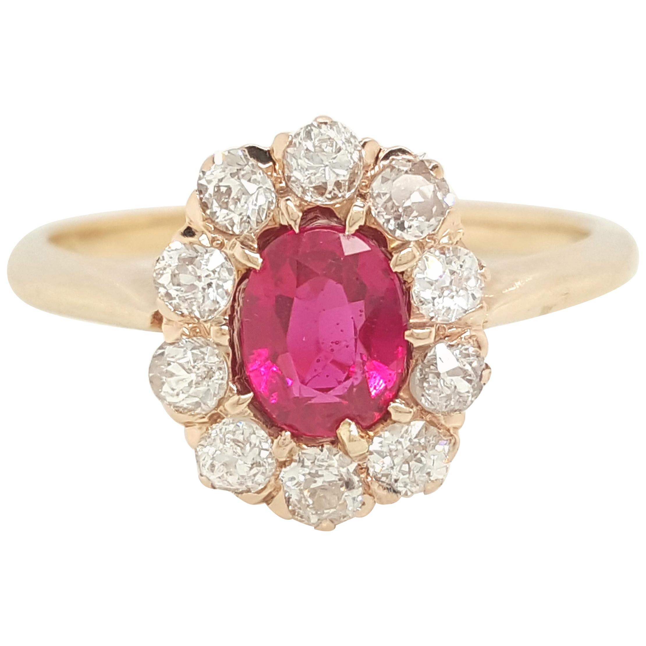 Vintage 14 Karat Yellow Gold Oval Ruby and Diamond Ring at 1stDibs