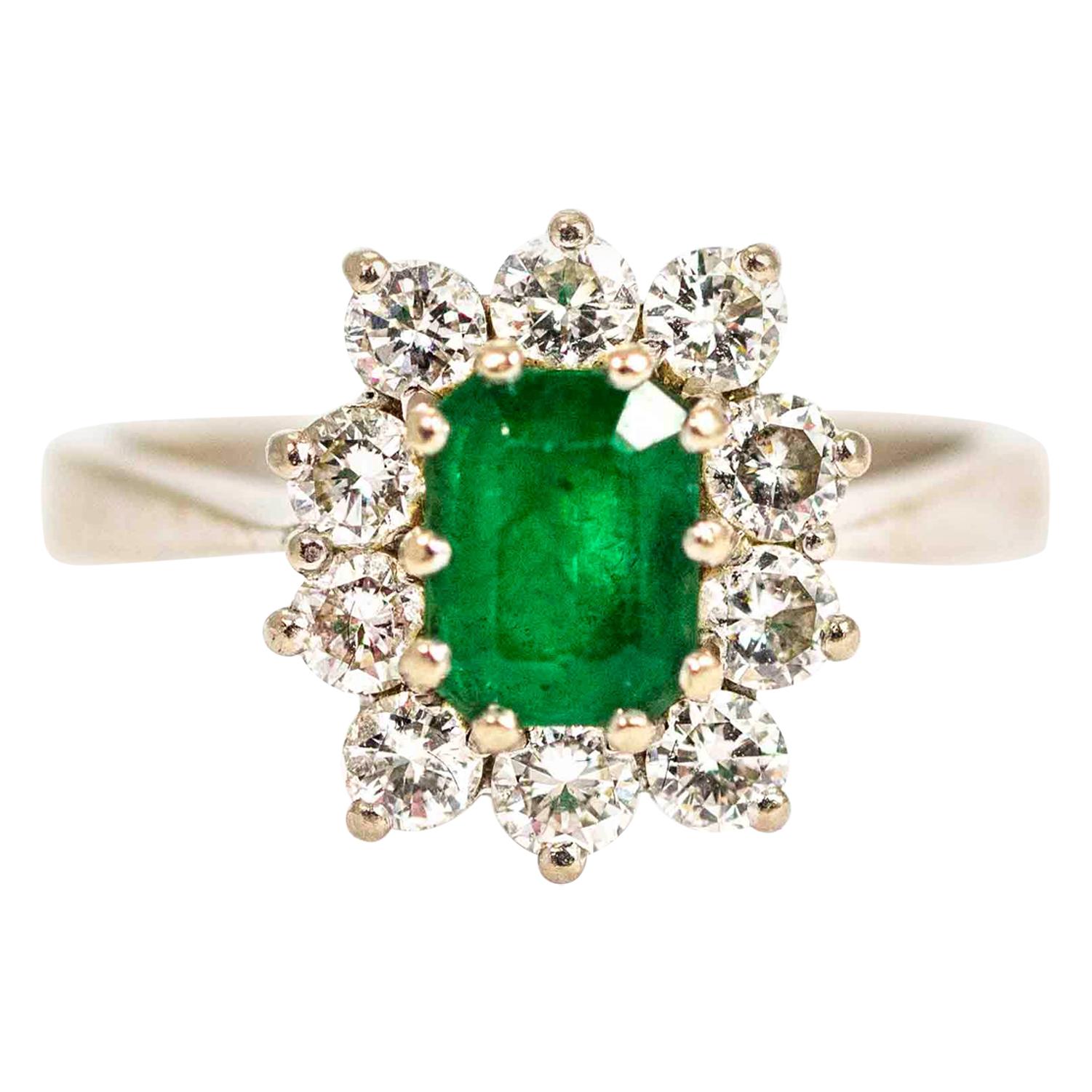 Vintage 18 Carat White Gold Emerald and Diamond Cluster Ring at 1stDibs