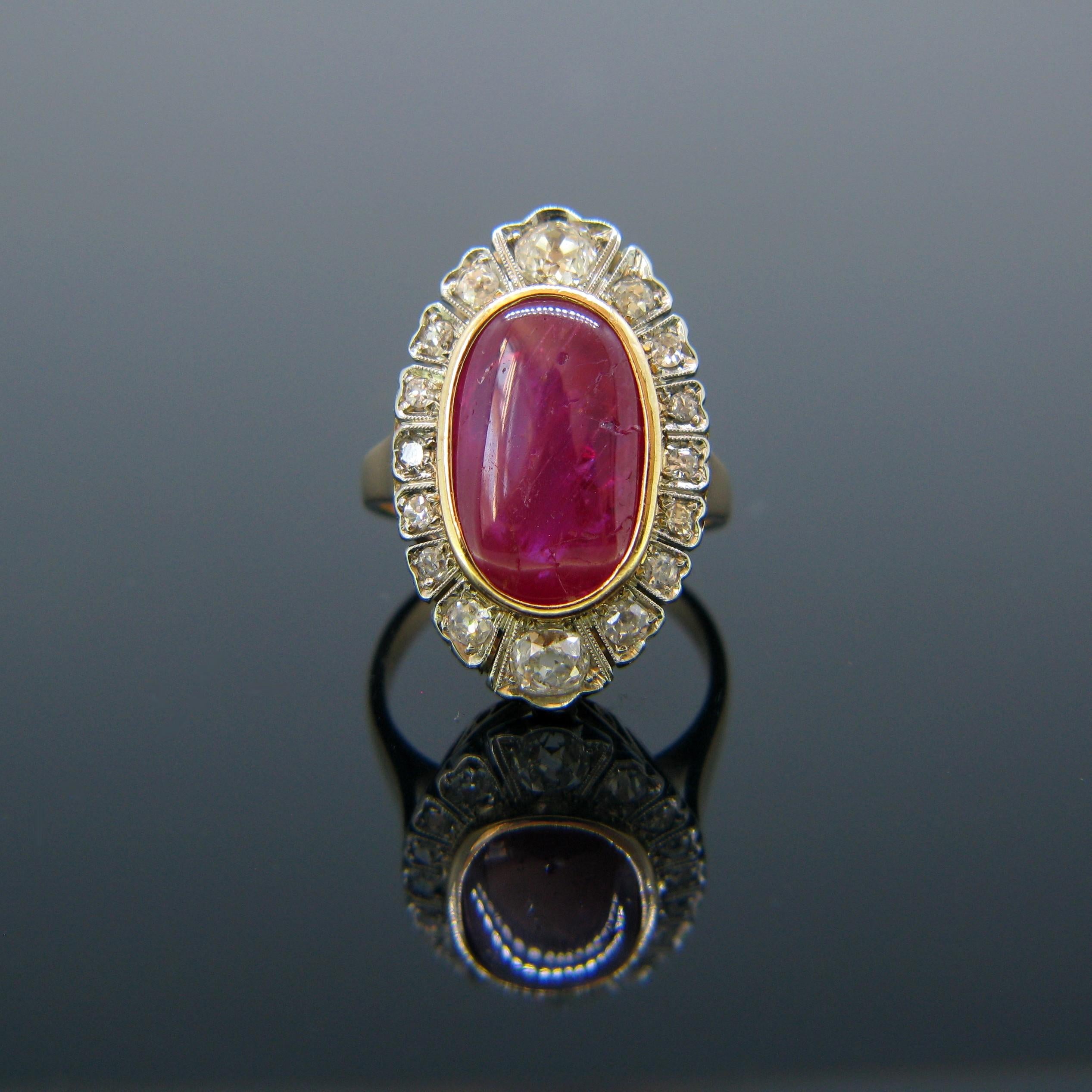 Vintage 1940s 10 Carat Ruby Cabochon and Diamonds Cluster Ring at 1stDibs