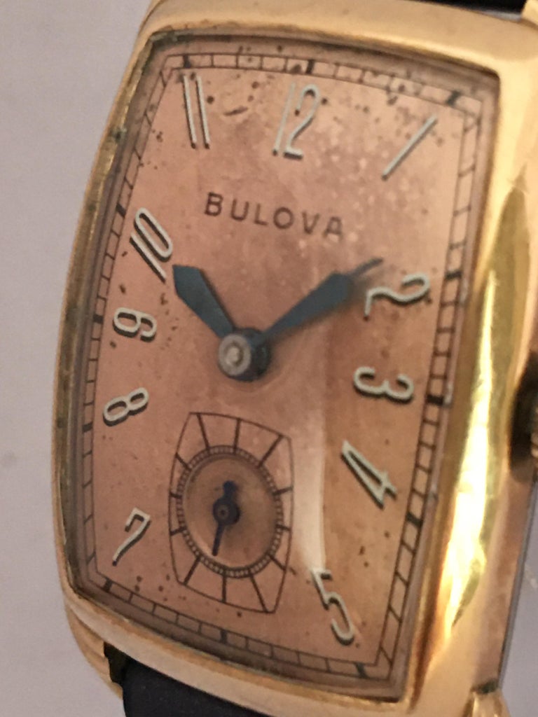 Vintage 1940s Bulova Rectangular Curved Rolled Gold and Stainless Steel Watch at 1stDibs ...
