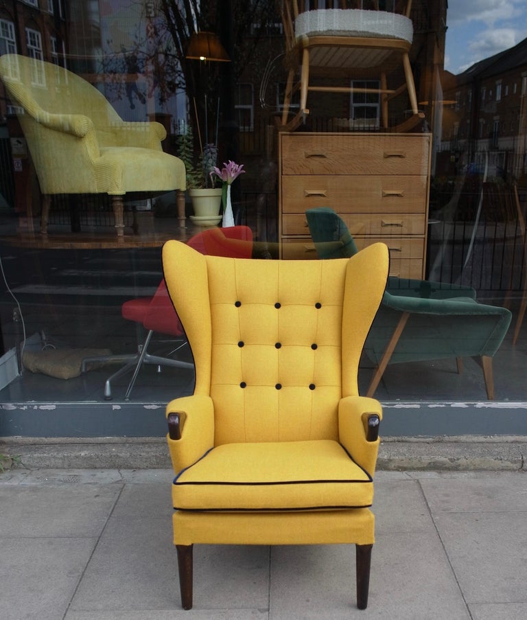Vintage 1950s British wingback armchair upholstered in quality yellow ...