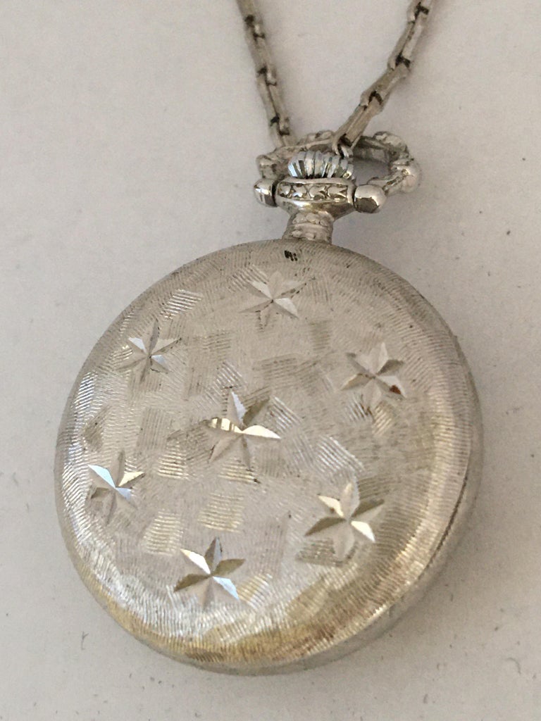 Vintage 1960s Hand-Winding Silver Plated Engraved Pendant Watch at 1stDibs