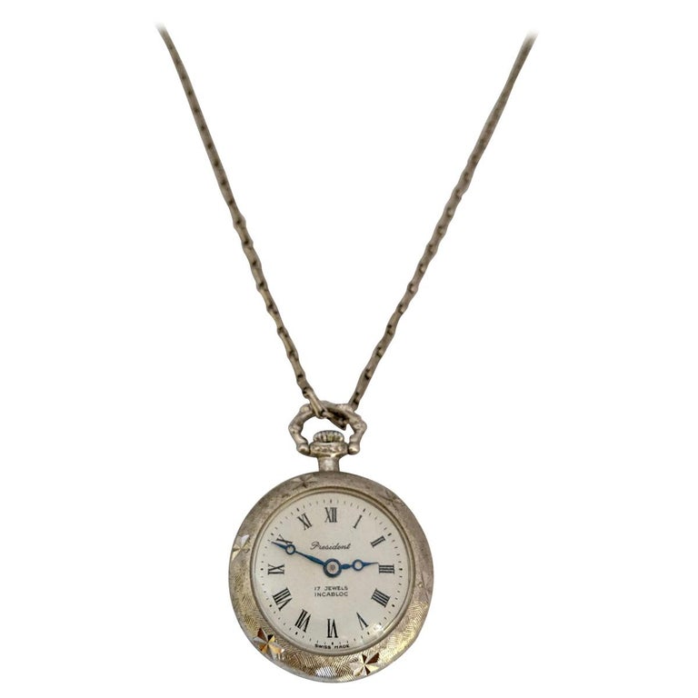 Vintage 1960s Hand-Winding Silver Plated Engraved Pendant Watch at 1stDibs