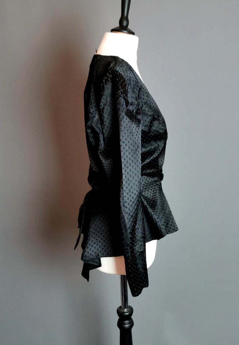 Vintage 80s peplum waist blouse, Bow back, Vampy For Sale at 1stDibs
