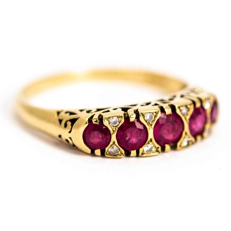 Vintage 9 Carat Gold Ruby Five-Stone Ring with Diamond Points at 1stDibs