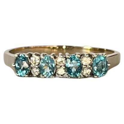 Vintage Aqua and Diamond 9 Carat Gold Four-Stone Ring For Sale at 1stDibs