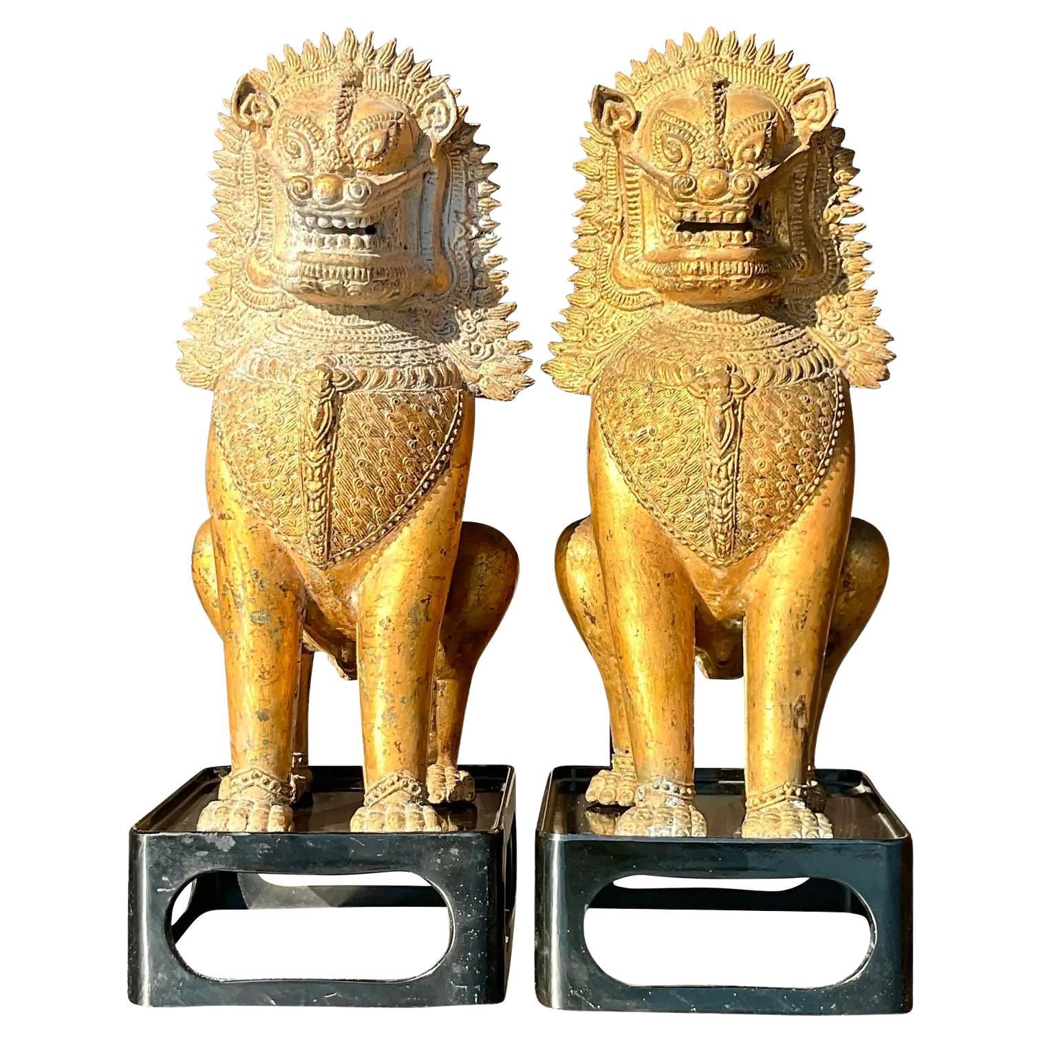 Pair of Chinese Foo Dogs on Pedestals in Bronze at 1stDibs