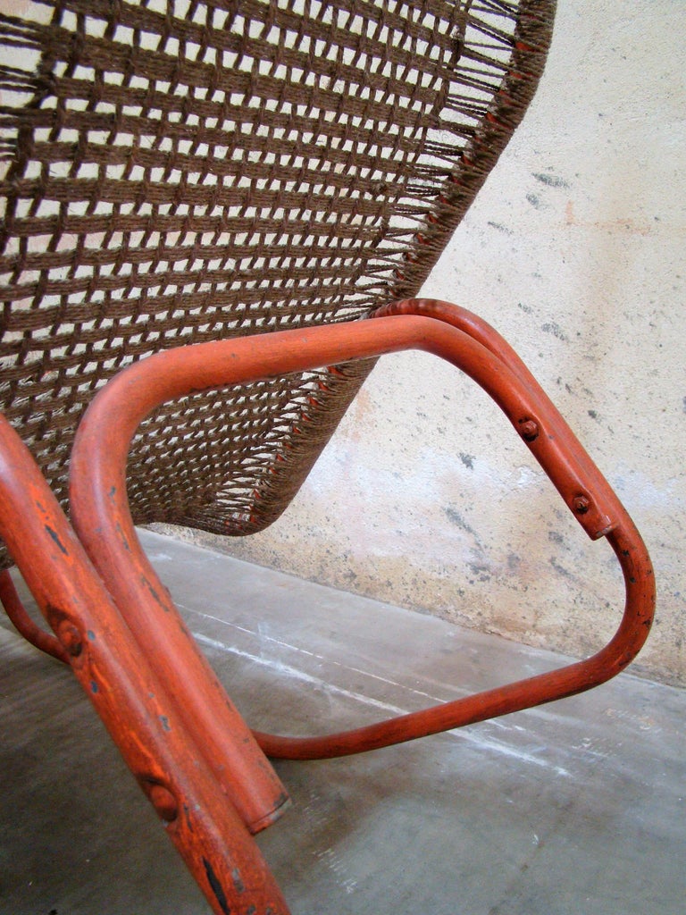 Vintage Barwa Lounge Chair Enameled Orange with Woven Cord at 1stDibs