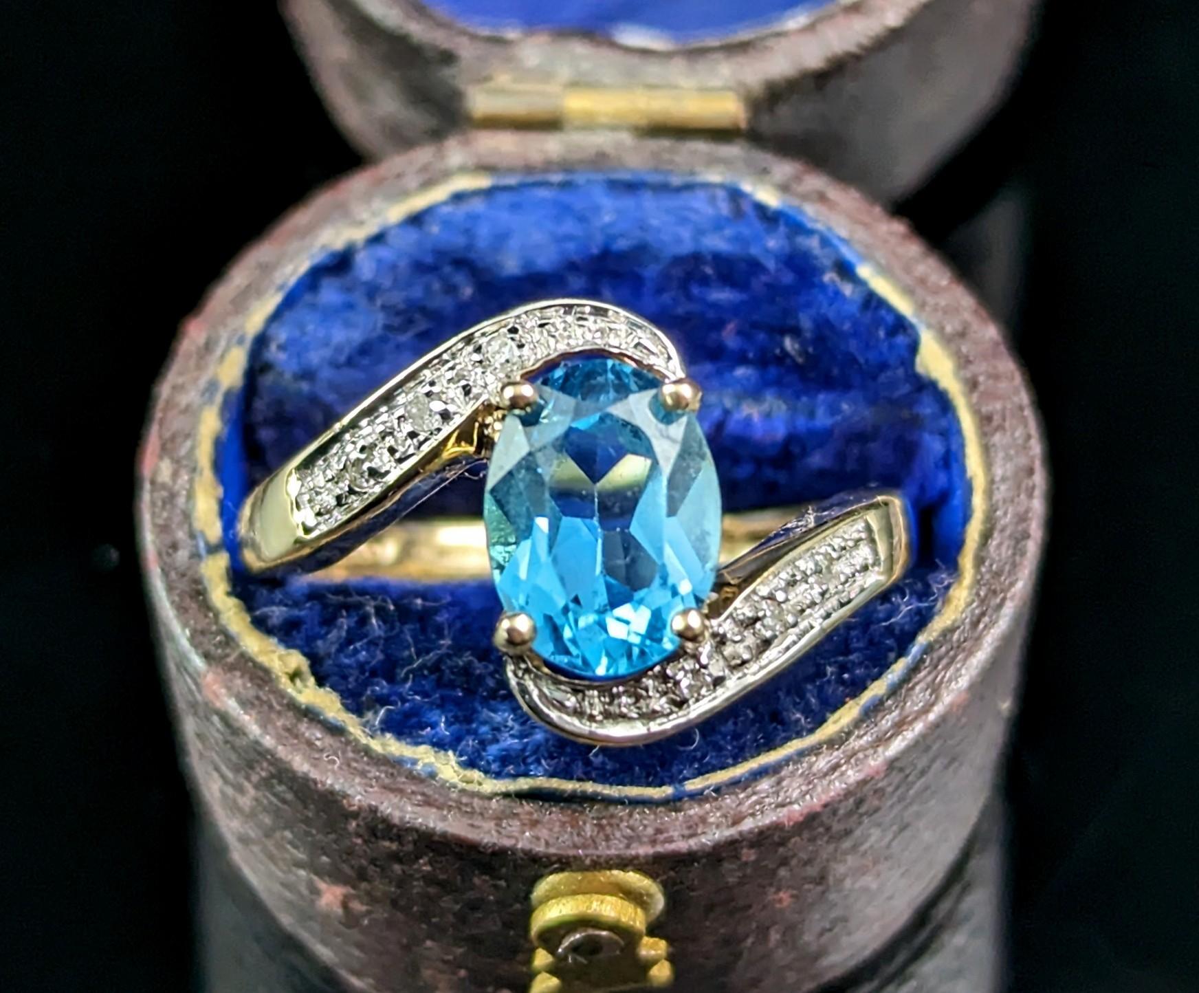 Vintage Blue Topaz and Diamond crossover ring, 9k gold at 1stDibs