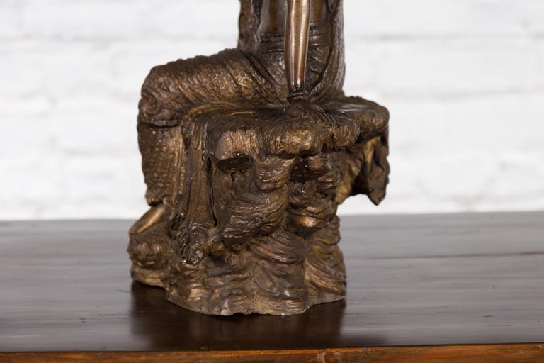 Vintage Bronze Statuette Depicting Quan Yin Seated on a Rocky Formation ...