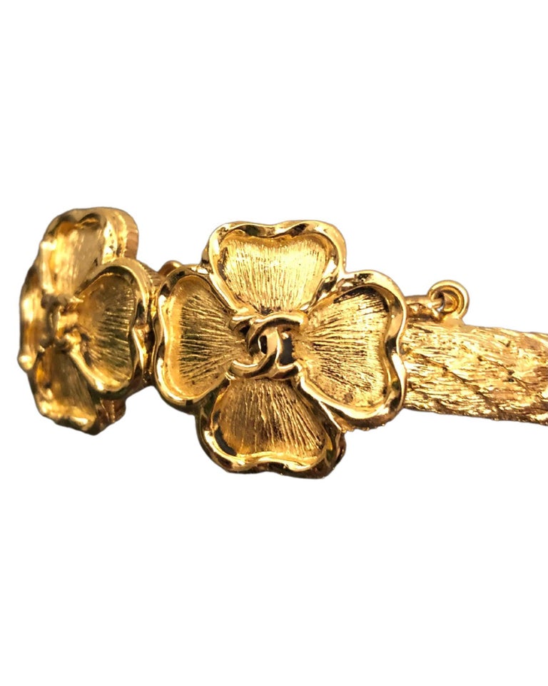 Vintage CHANEL Gold Toned CC Clover Cuff Bracelet For Sale at 1stDibs