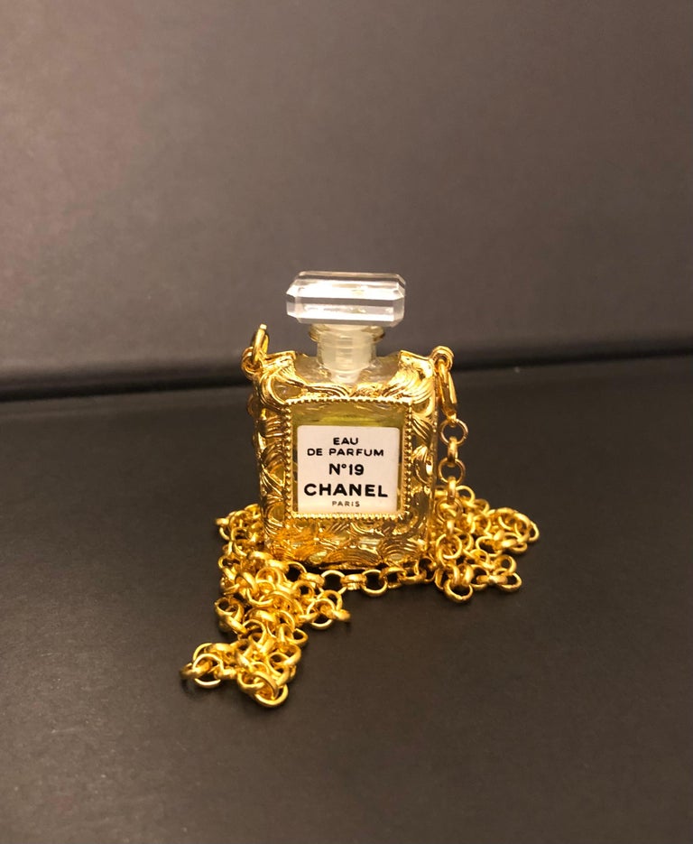 Vintage CHANEL Gold Toned No 19 Perfume Chain Necklace For Sale at 1stDibs
