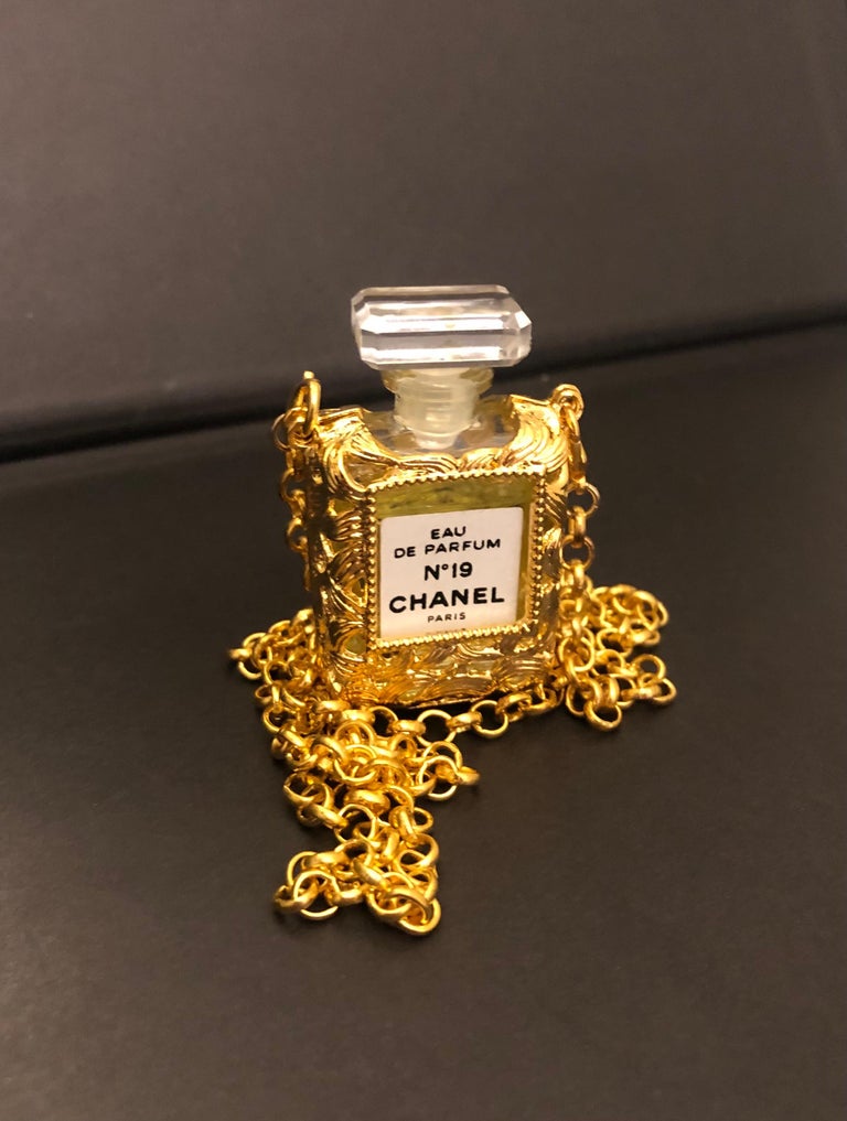 Vintage CHANEL Gold Toned No 19 Perfume Chain Necklace For Sale at 1stDibs