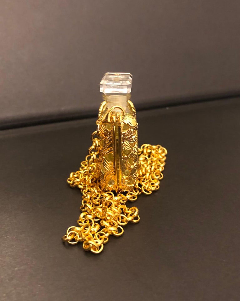 Vintage CHANEL Gold Toned No 19 Perfume Chain Necklace For Sale at 1stDibs