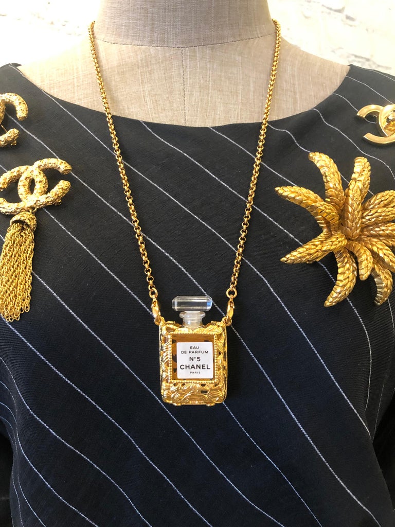 Vintage CHANEL Gold Toned No 5 Perfume Chain Necklace For Sale at 1stDibs