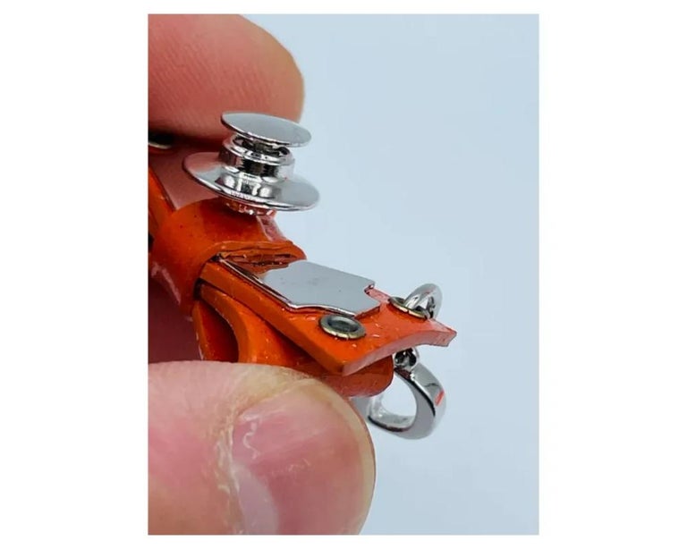 Vintage Christian Dior Orange Dior Bowtie Pin For Sale at 1stDibs