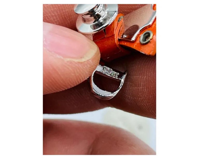 Vintage Christian Dior Orange Dior Bowtie Pin For Sale at 1stDibs
