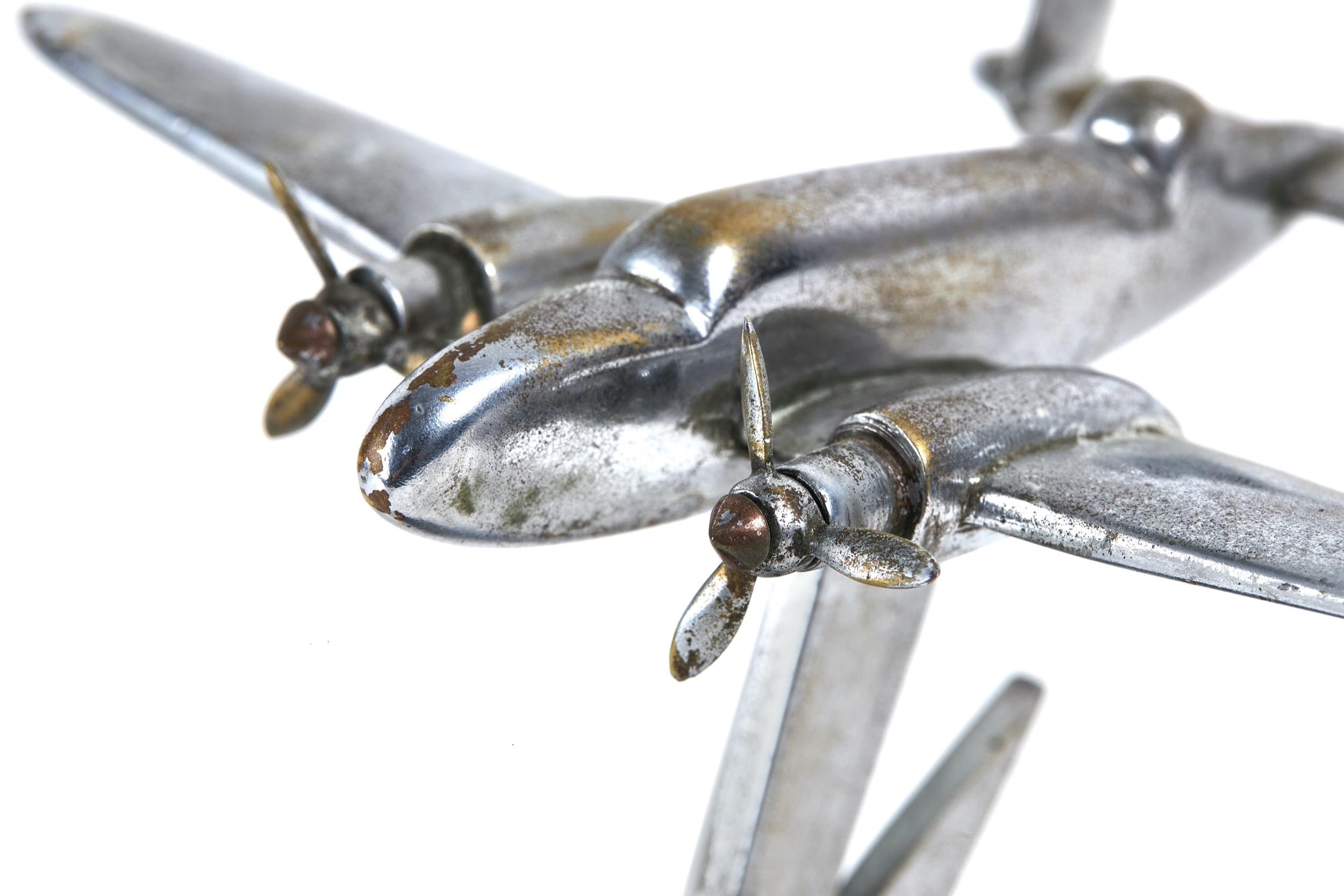 vintage Chrome model of WW11 Bomber Airplane on stand For Sale at 1stDibs