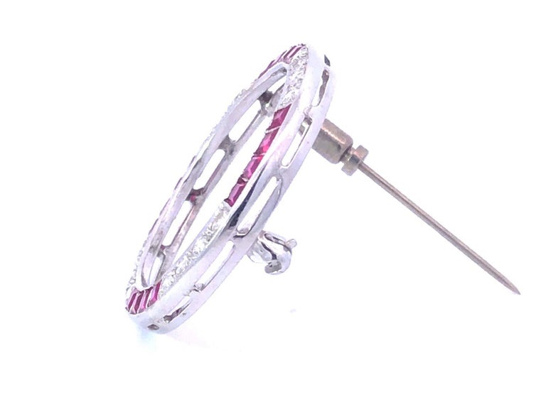Vintage Diamond and Ruby Circle Brooch in Platinum For Sale at 1stDibs