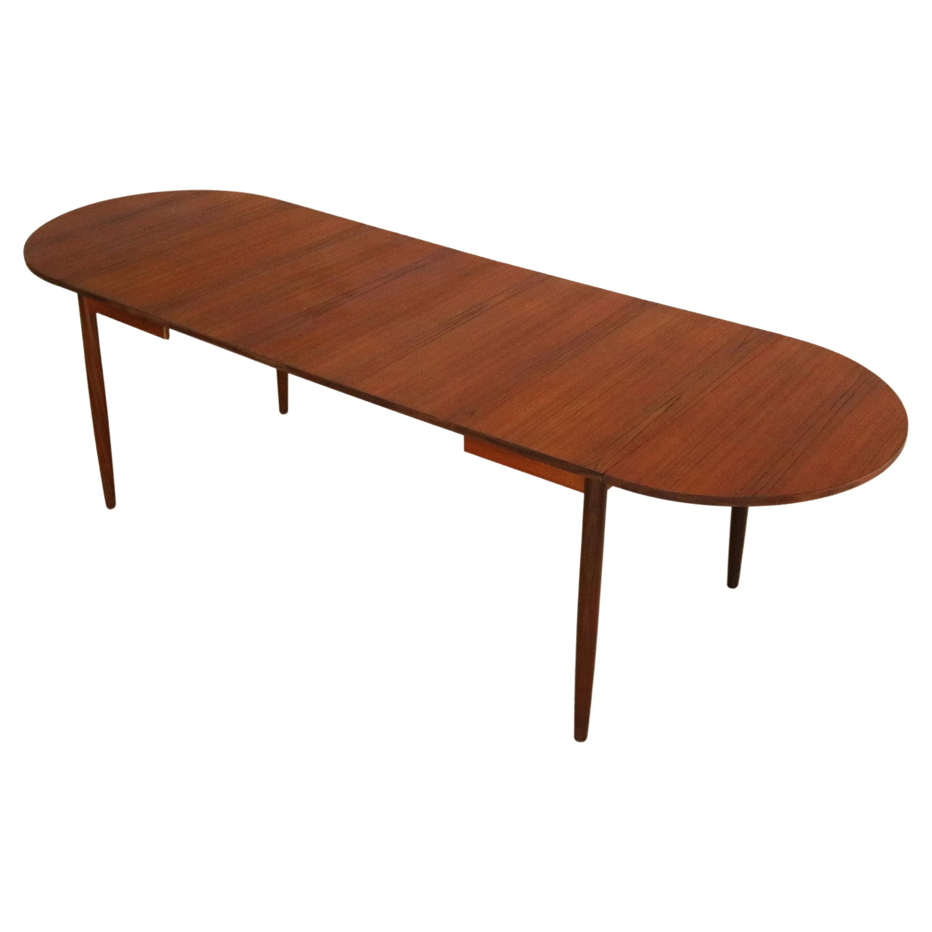 Vintage Danish Round Extendable Pedestal Dining Table at 1stDibs