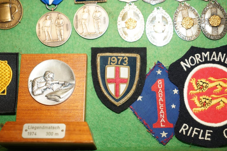 VINTAGE DISPLAY CASE FULL OF SHOOTiNG SNIPER MEDALS AND AWARDS MUST SEE ...