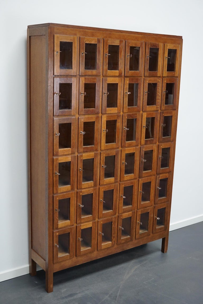 Vintage Dutch Oak Glass Door Locker Cabinet, 1930s at 1stDibs
