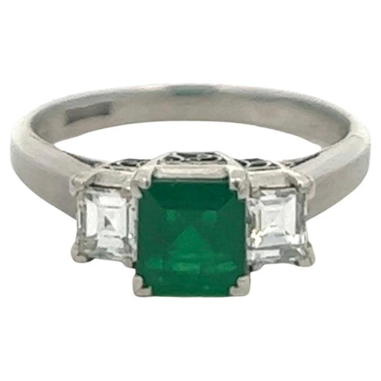 Vintage Emerald Diamond Platinum Three Stone Ring For Sale at 1stDibs