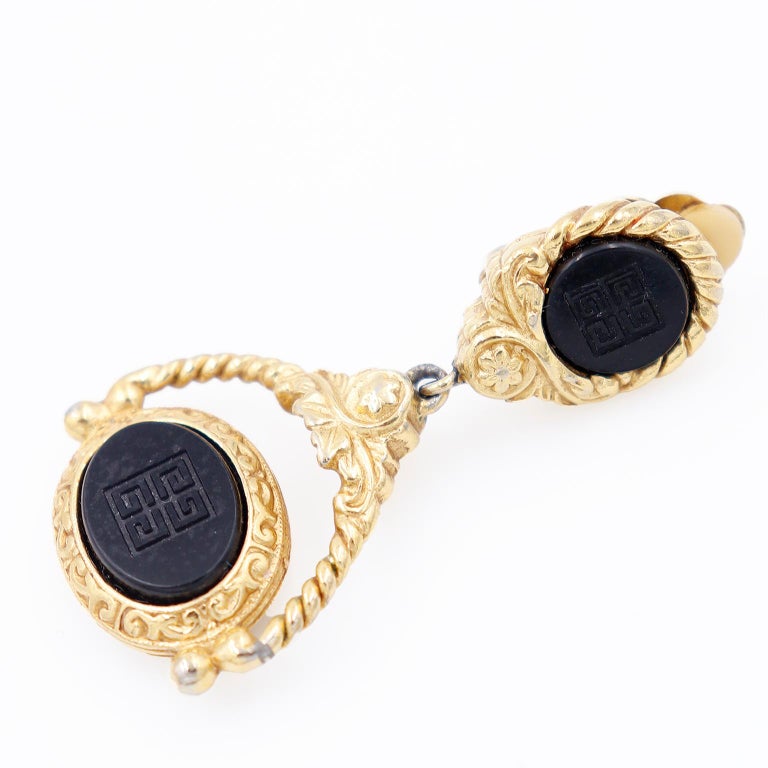 Vintage Givenchy Carved Black Logo Gold Drop Earrings For Sale at 1stDibs
