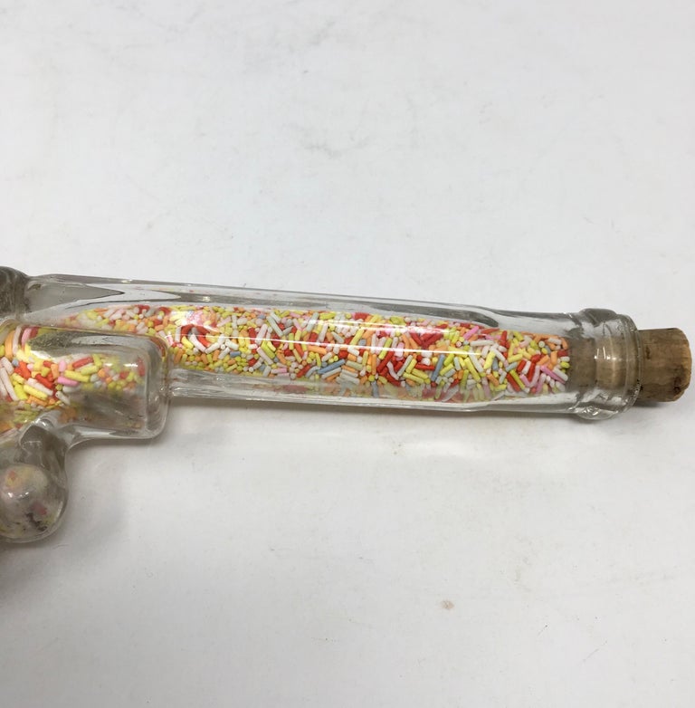Vintage Glass Gun Candy Dispenser For Sale at 1stdibs