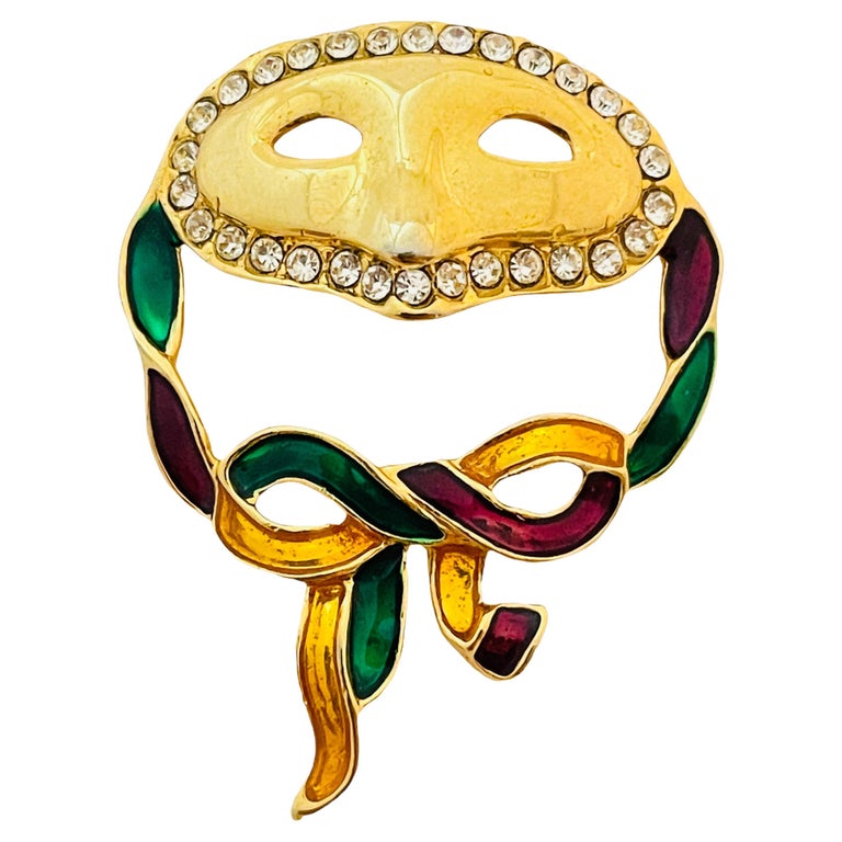 Vintage gold enamel rhinestone mask designer runway brooch at 1stDibs