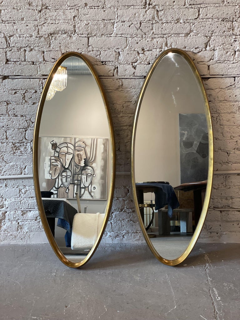 Vintage Gold Gilt Oval Mirrors, a Pair For Sale at 1stDibs