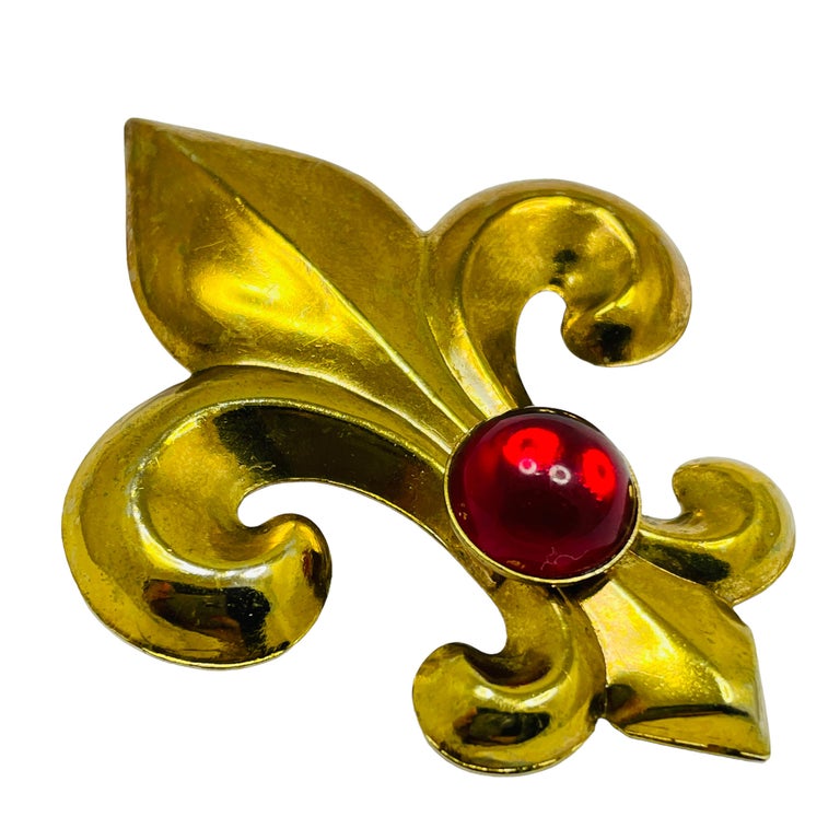 Vintage gold red fleur de lis designer runway brooch For Sale at 1stDibs