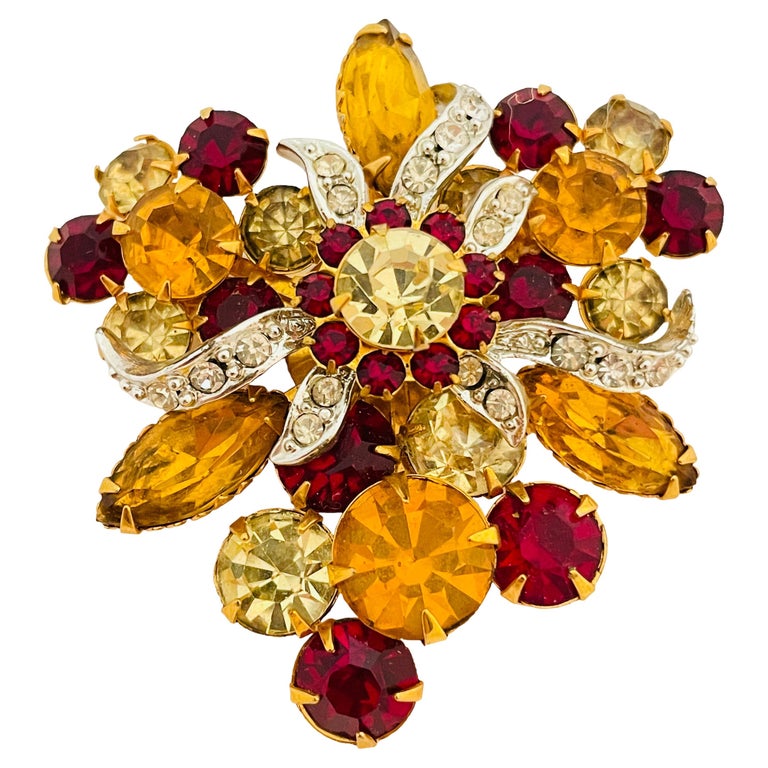 Vintage gold rhinestone designer brooch For Sale at 1stDibs