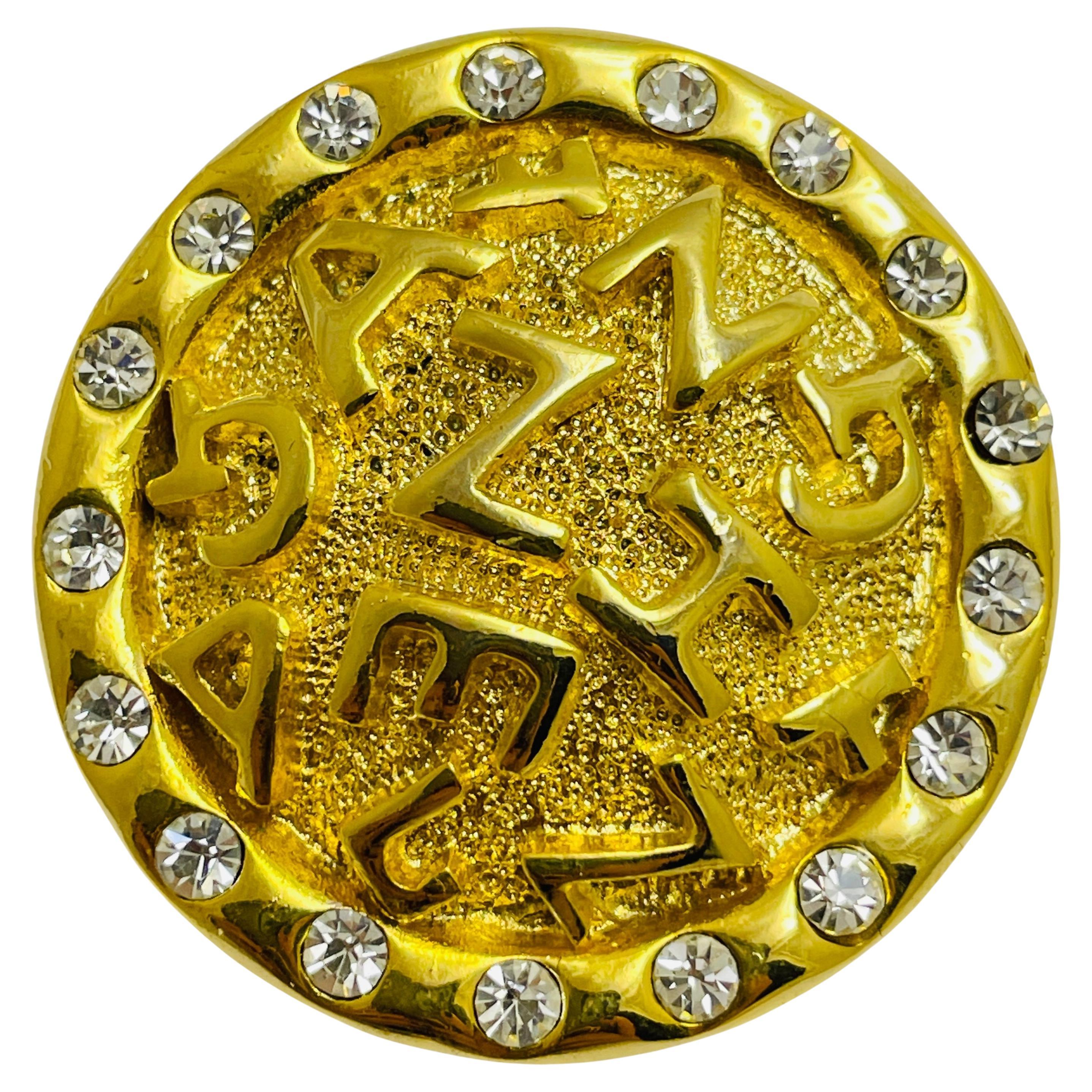 Vintage gold tone letters rhinestones designer brooch For Sale at 1stDibs