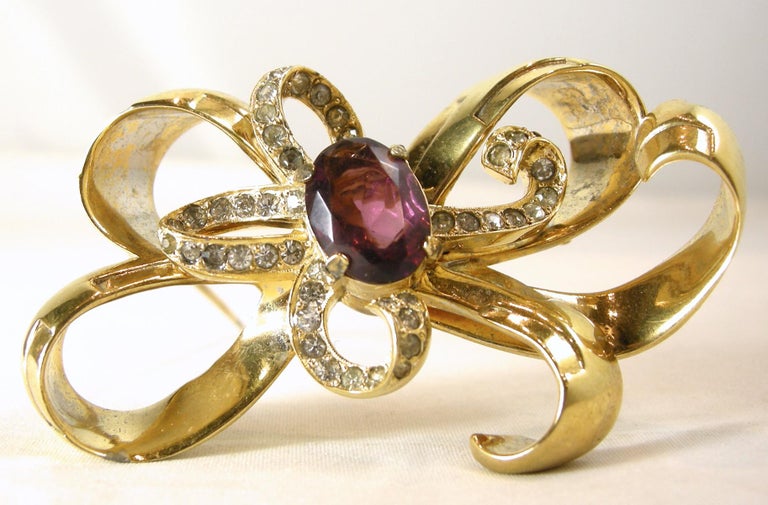 Vintage Mazer Swirl Bow Crystal Brooch For Sale at 1stDibs