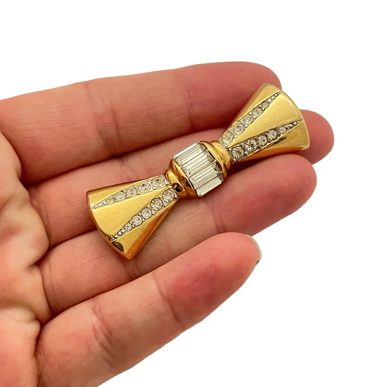 Vintage MONET bow gold rhinestone designer brooch For Sale at 1stDibs