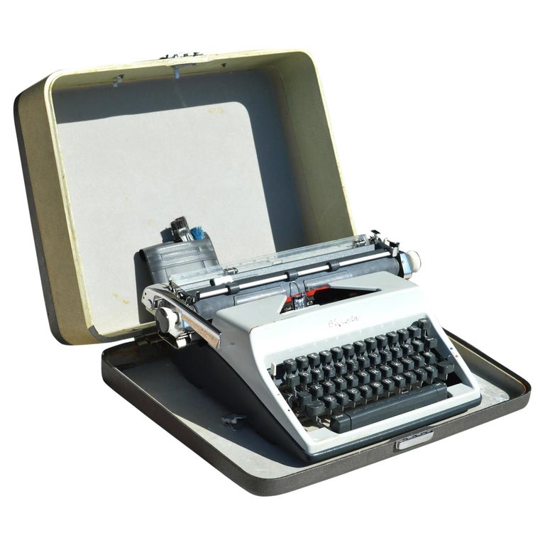 Vintage Olympia De Luxe Portable Typewriter with Carrying Case For Sale ...