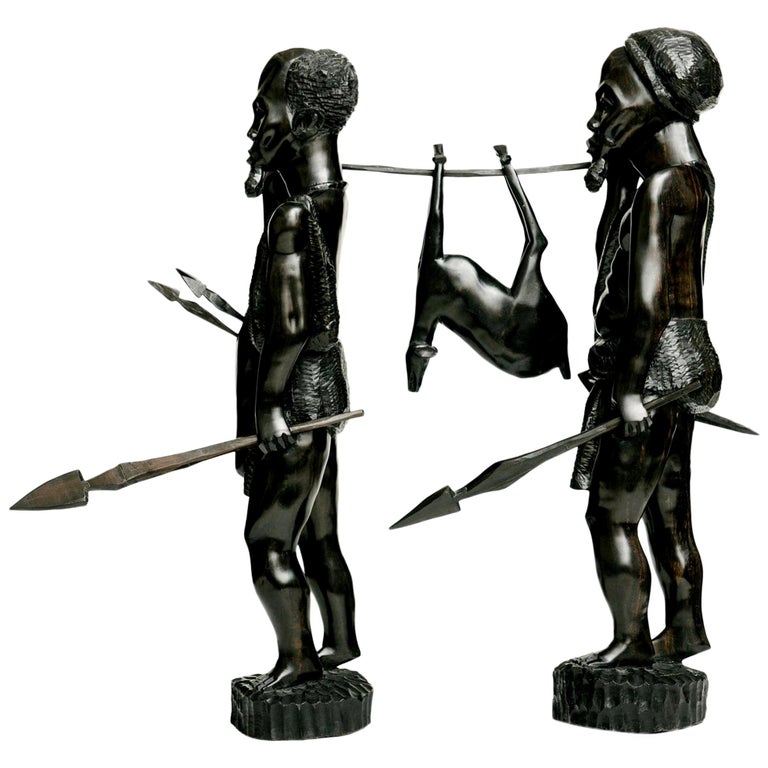 Vintage Pair of African Ebonized Carved Hunters For Sale at 1stDibs