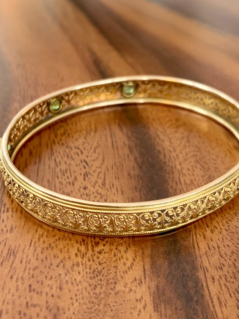 Vintage Peridot 14 Karat Yellow Gold Bangle Bracelet at 1stDibs